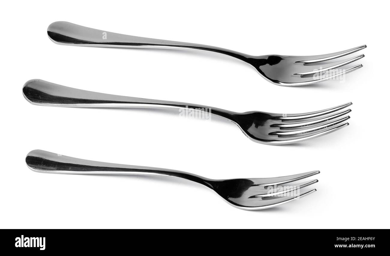 Set of dining forks isolated on white background Stock Photo - Alamy