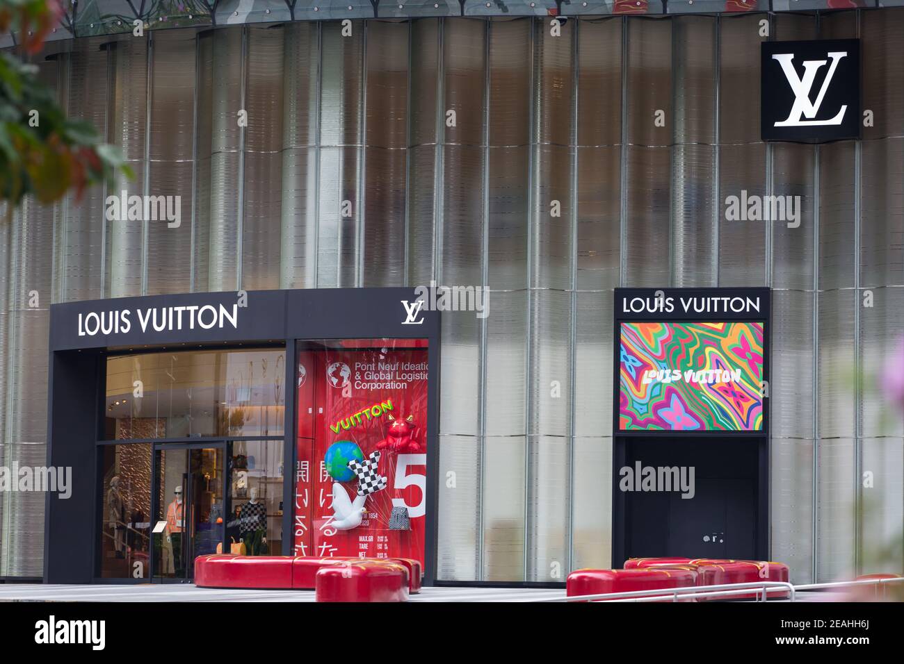 Display window and shop front at Louis Vuitton, Singapore Stock Photo ...