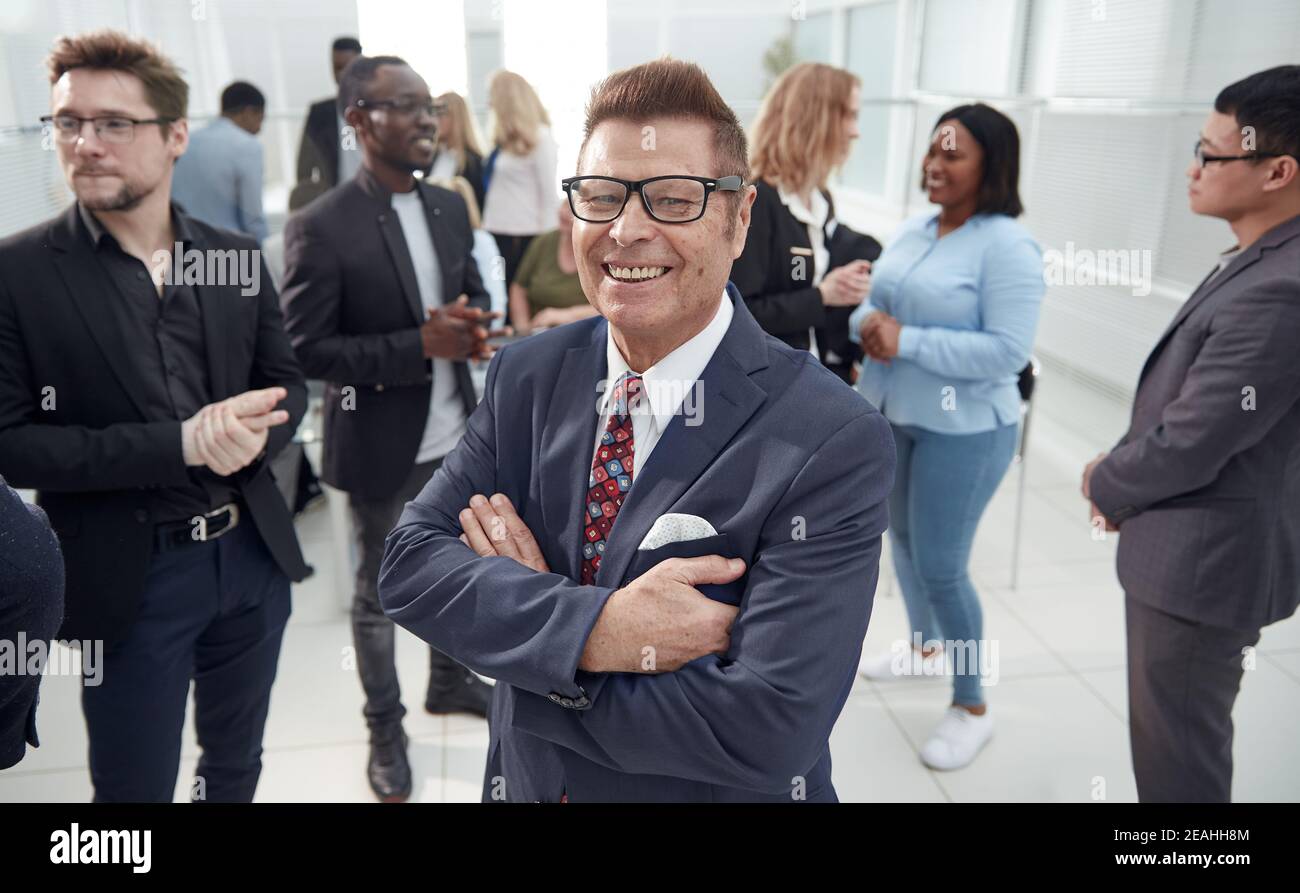 close up. successful business man standing in the office Stock Photo ...