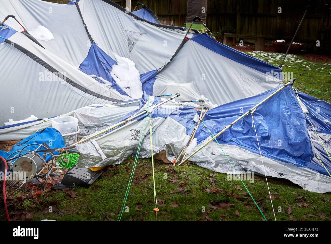 The destructive effect of wind, rain and snow on a tent during winter ...