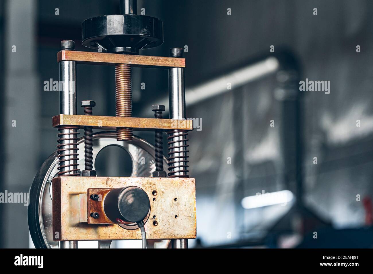 Metal production equipment at the cable plant Stock Photo - Alamy