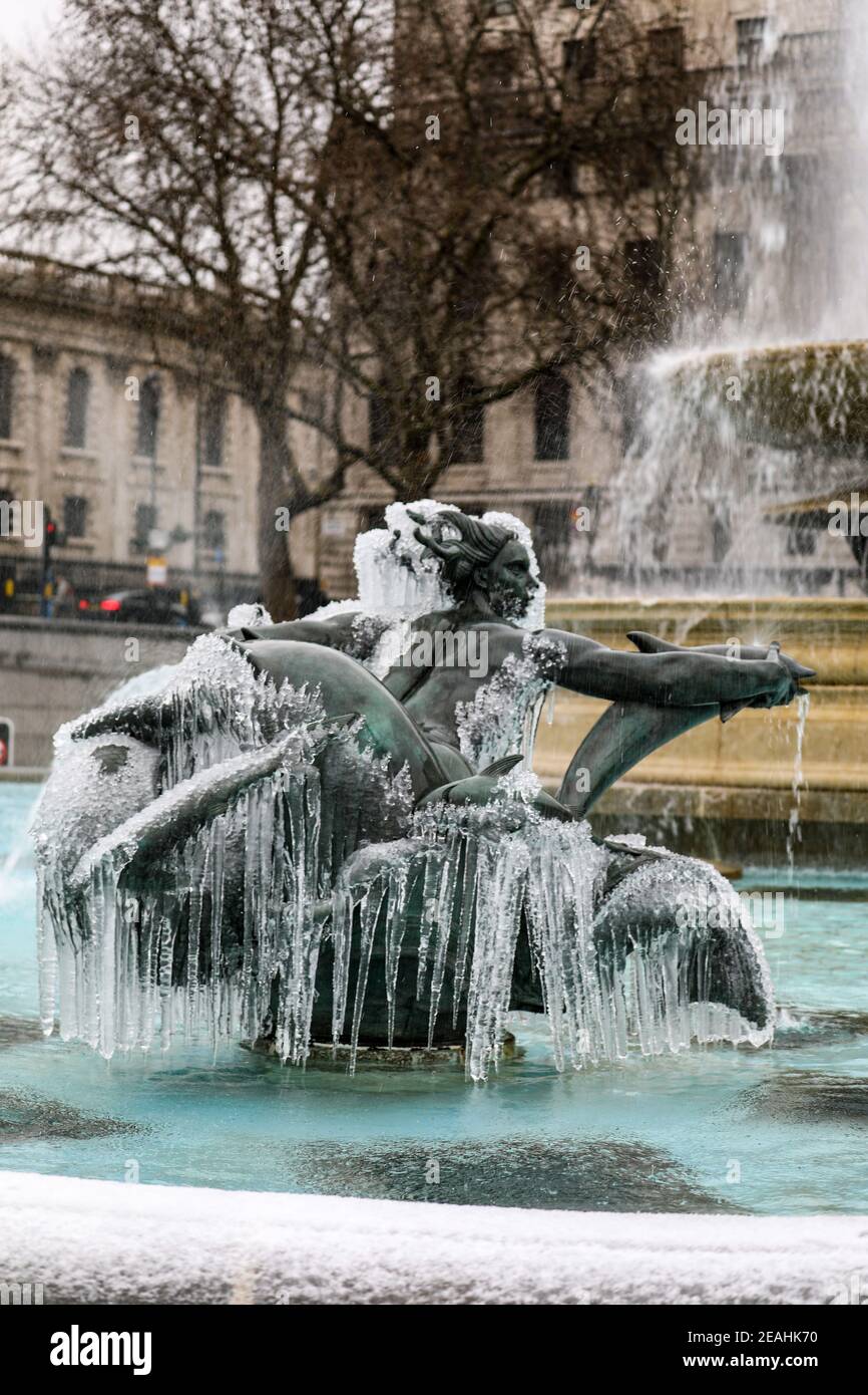 Fountains in Trafalgar Square are pictured Frozen.London has been ...