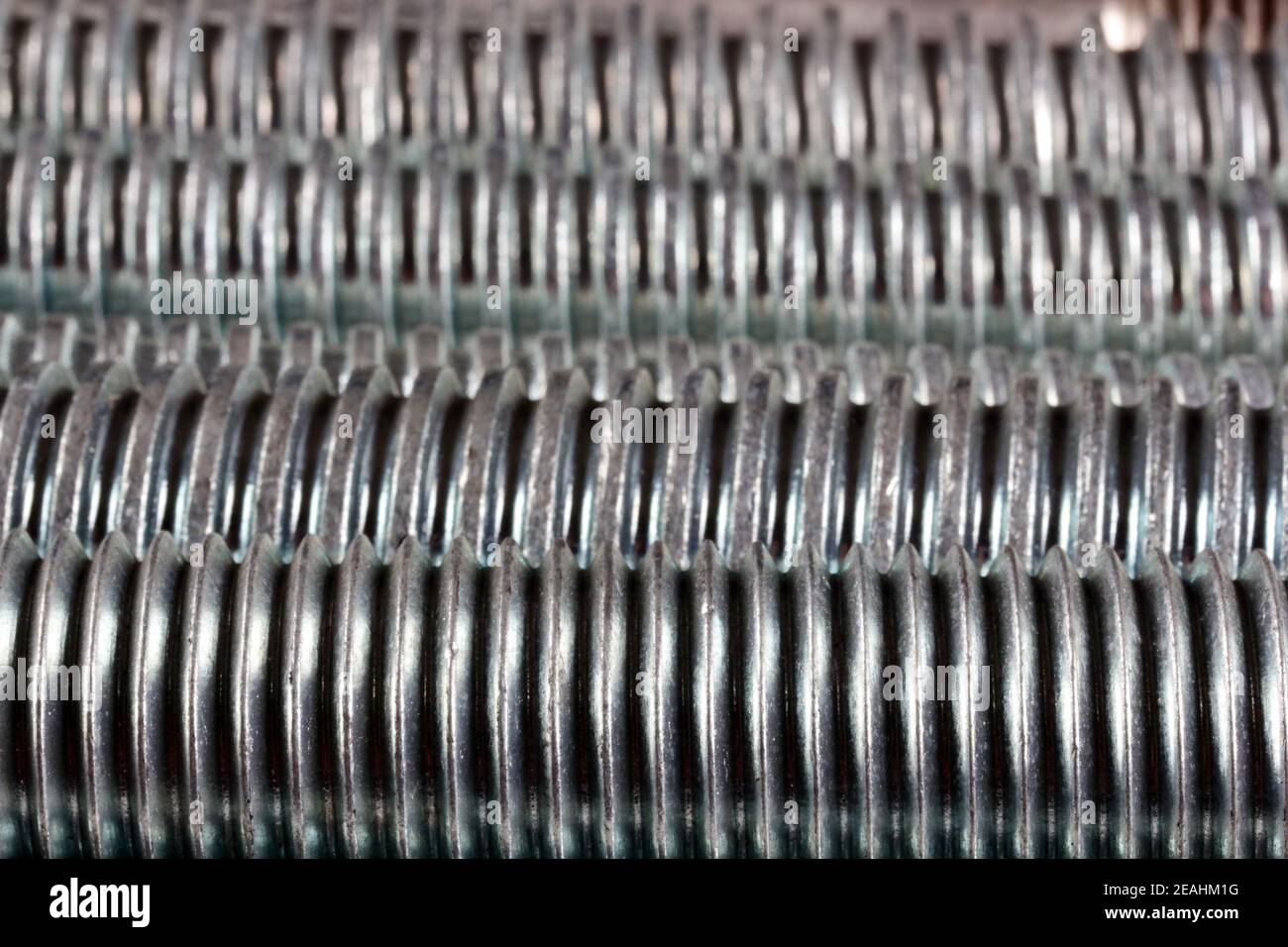 Newly manufactured large screws. Close up Stock Photo - Alamy