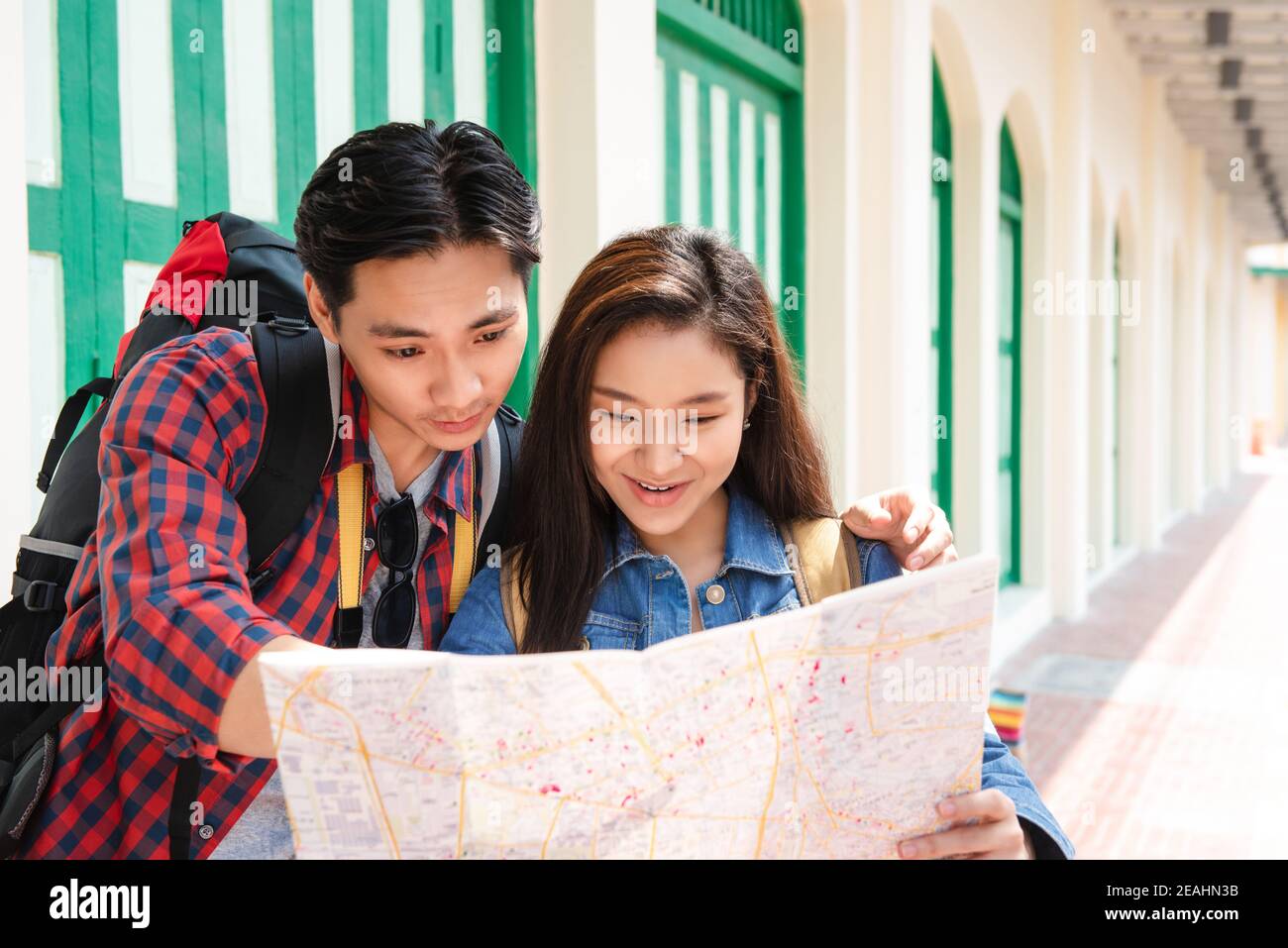 Asian male tourist map hi-res stock photography and images - Alamy