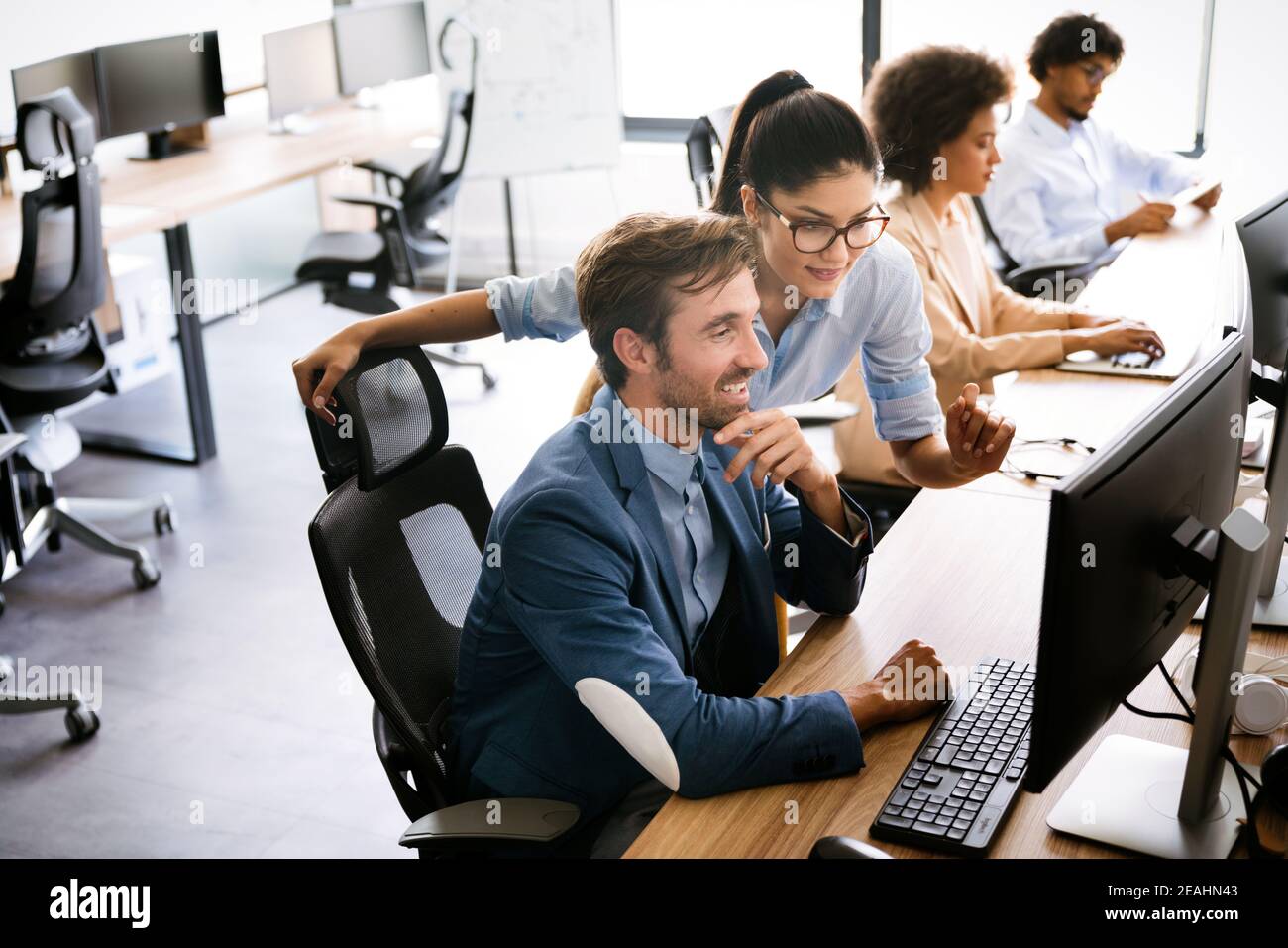 Startup business people group of programmer working as team to find ...