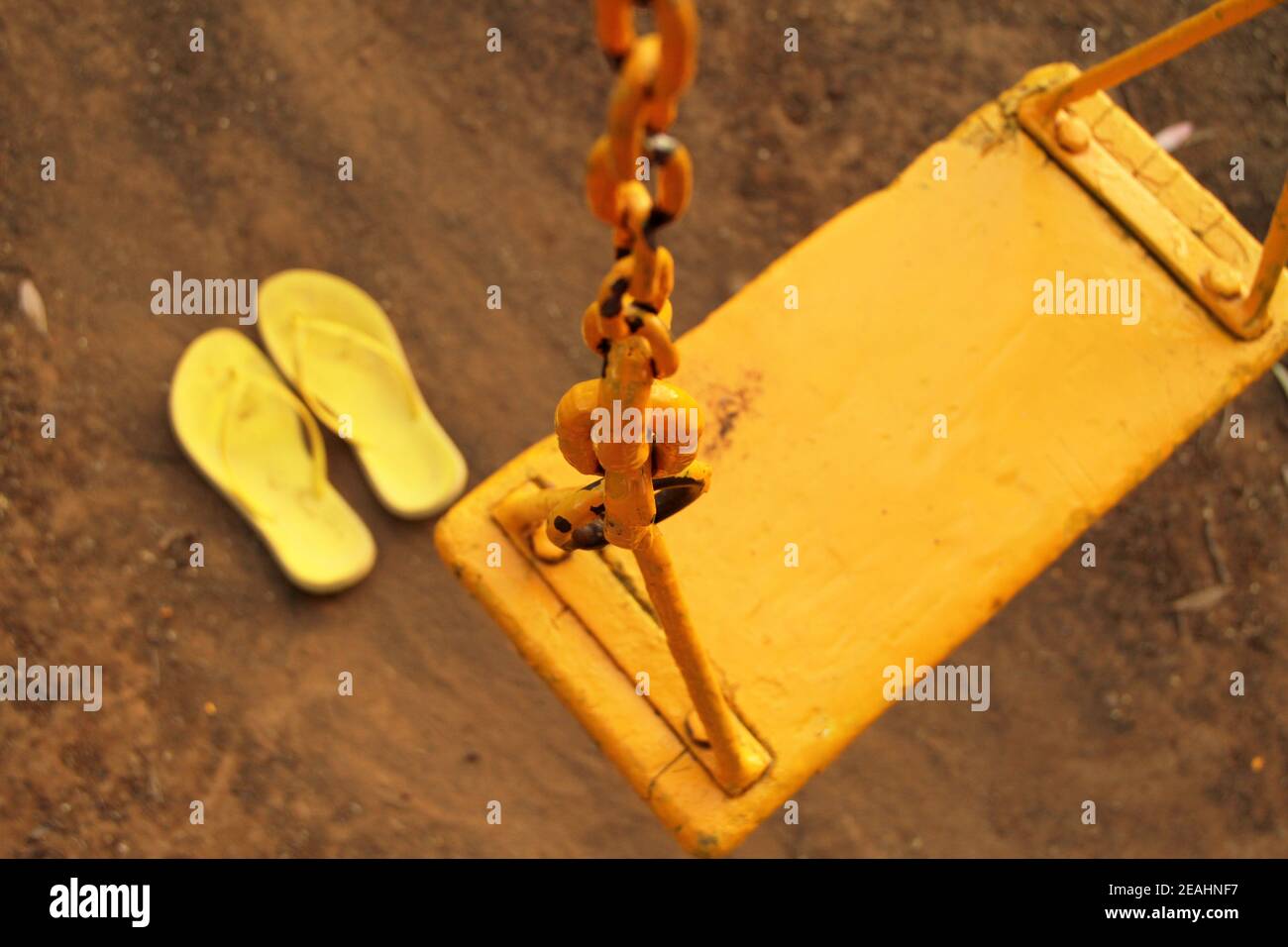 Flip flops on playground hi-res stock photography and images - Alamy