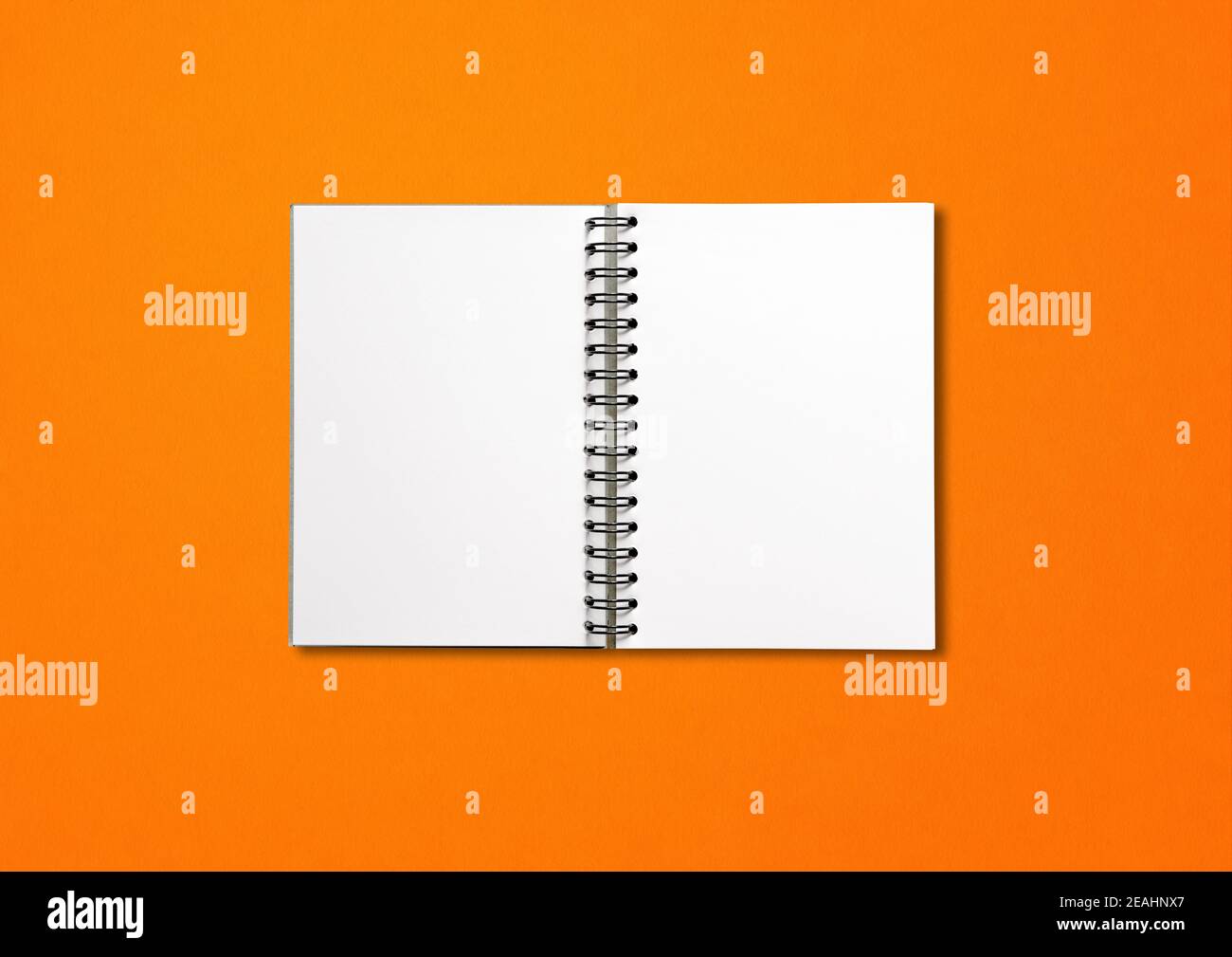 Blank open spiral notebook mockup isolated on orange background Stock ...