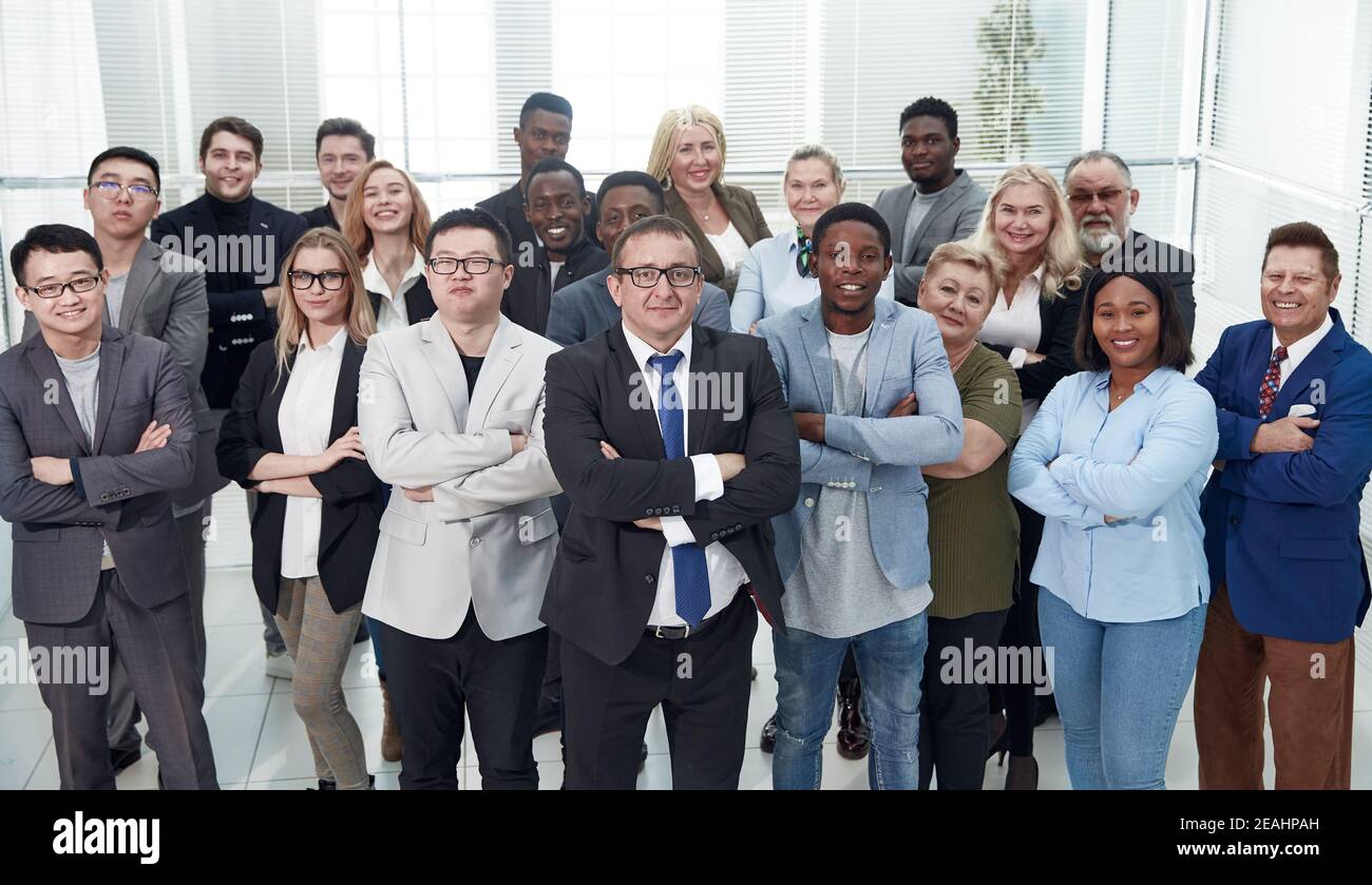 large group of diverse employees standing together Stock Photo - Alamy