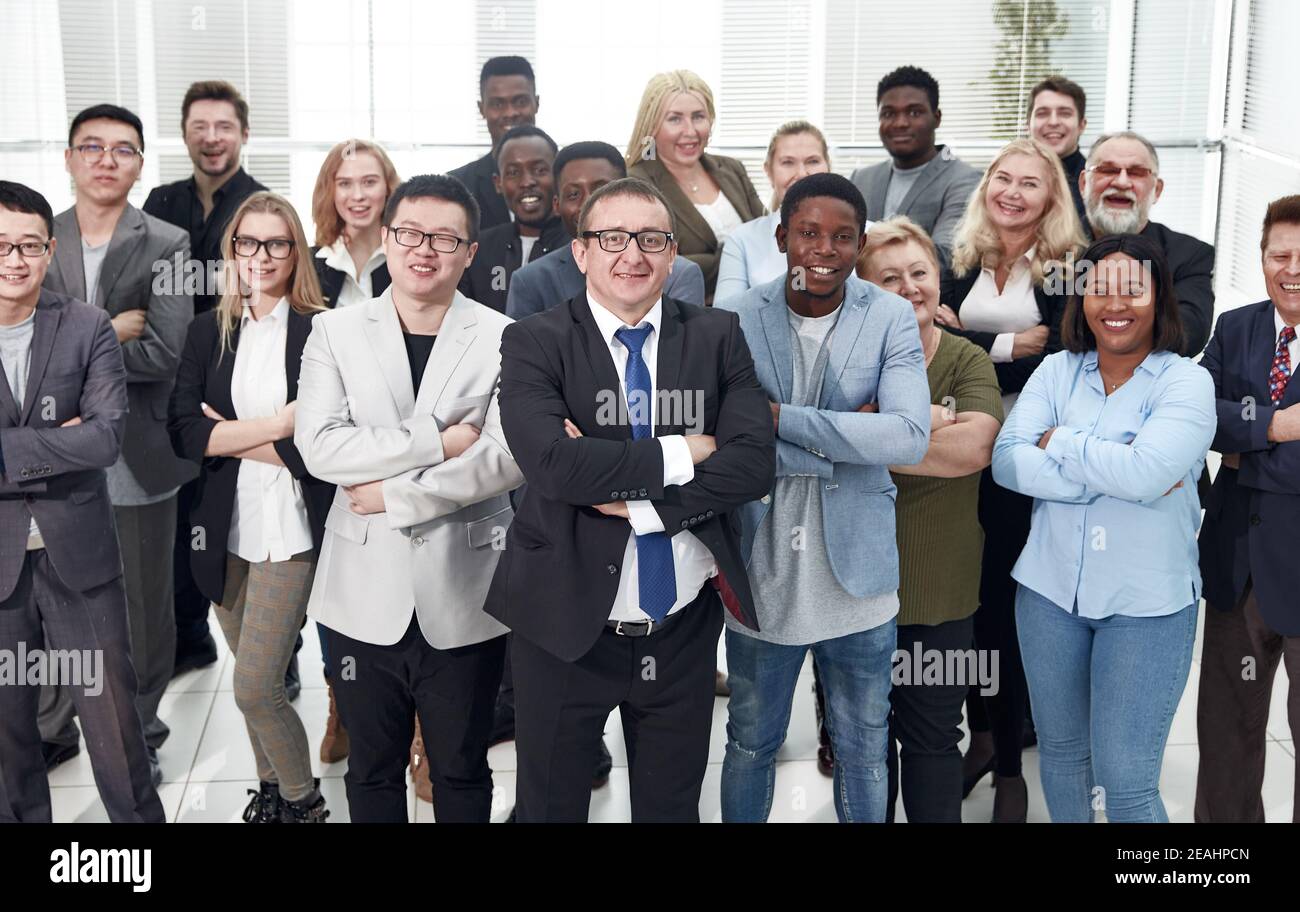 large group of diverse employees standing together Stock Photo - Alamy
