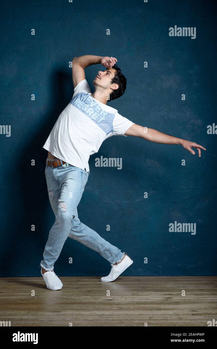 Italian male ballet dancer in edgy dance poses in the photo studio ...
