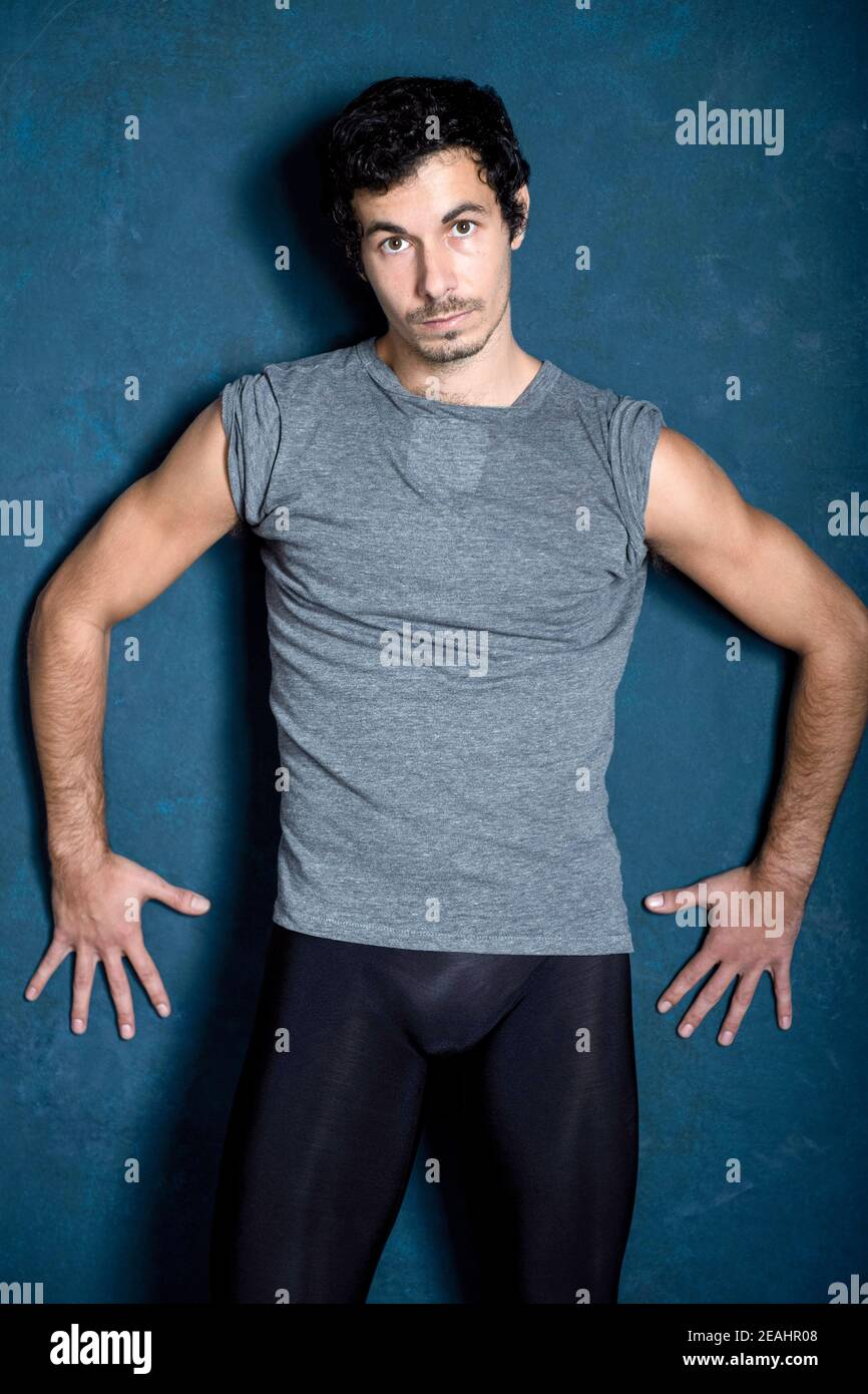 Male dancer in dynamic, modern dance poses and body movement in the ...