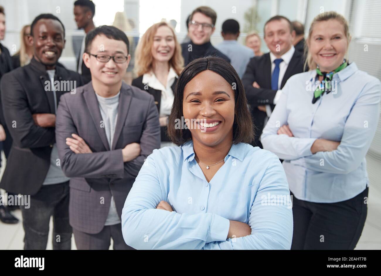 group of leading experts standing in the office lobby Stock Photo - Alamy