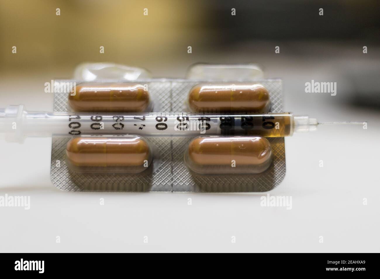 Orange capsules hi-res stock photography and images - Alamy