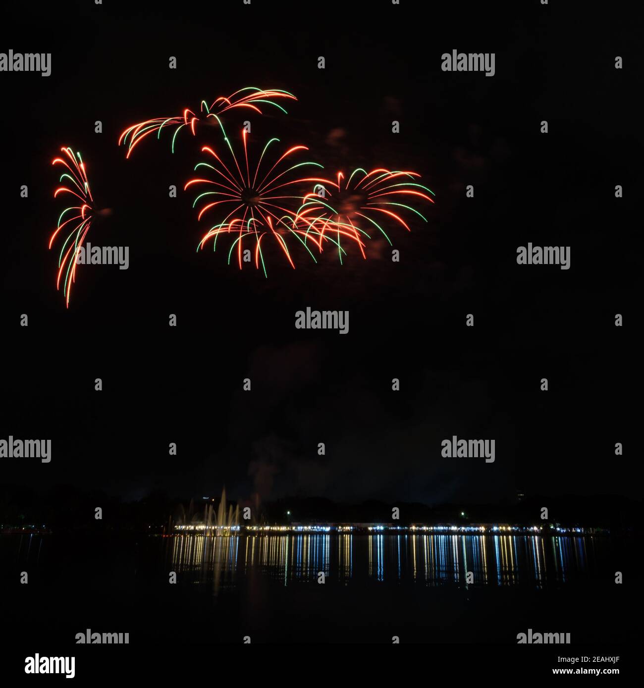 Colorful fireworks with reflection lights on lake Stock Photo - Alamy