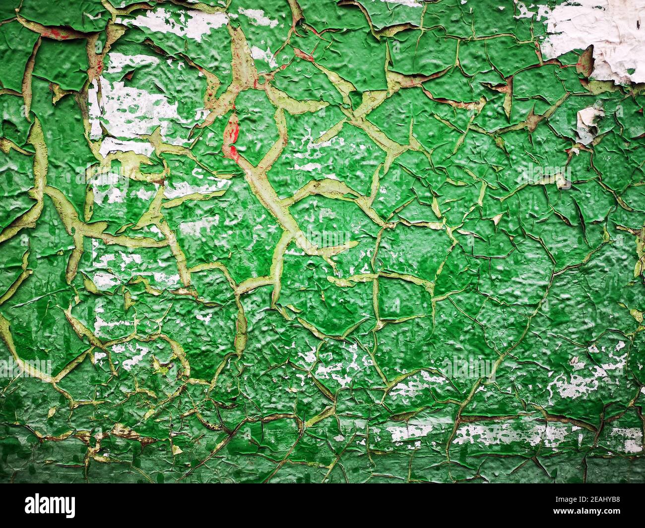 Old green paint is much cracked. Background texture closeup Stock Photo ...