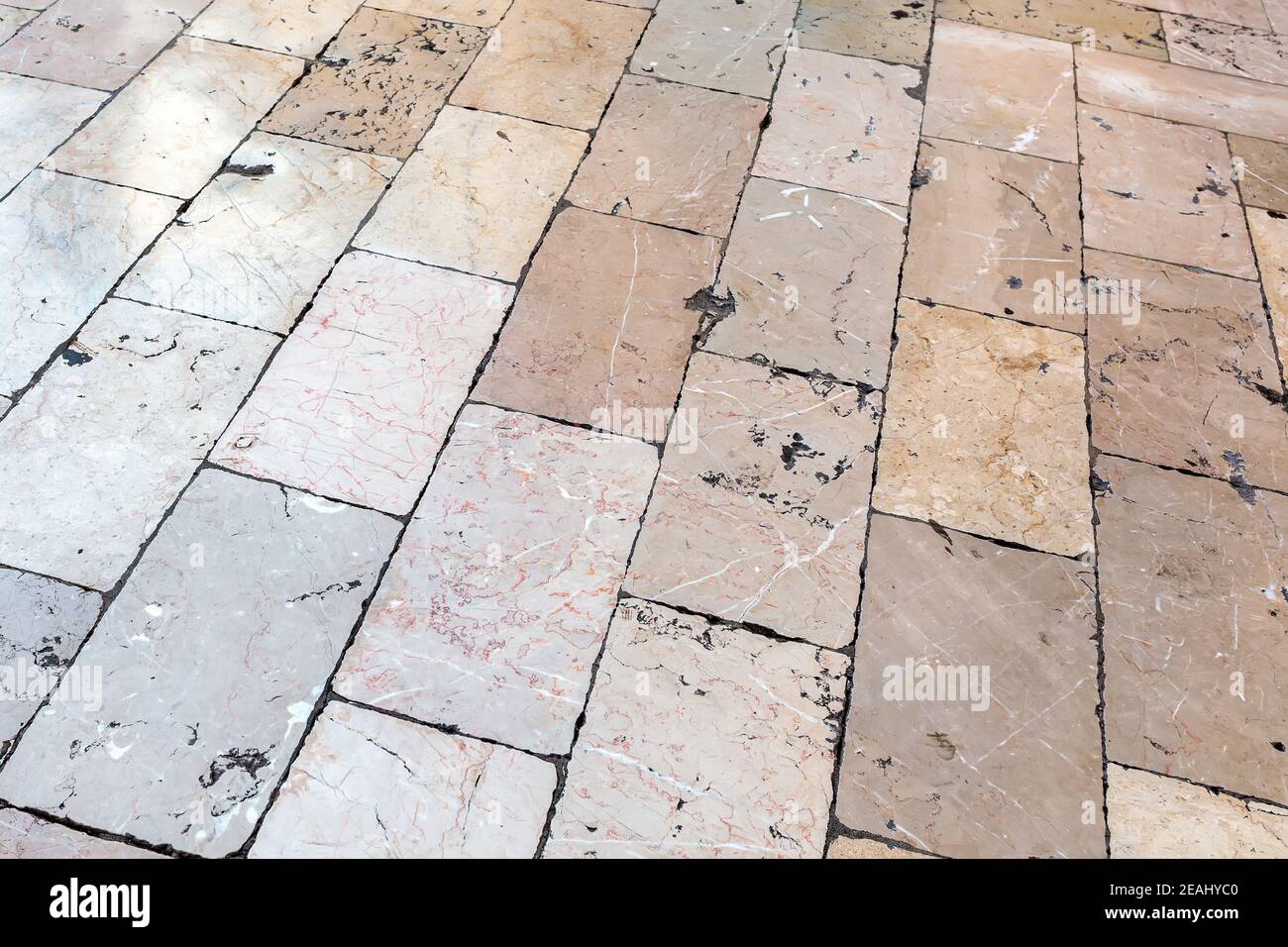 Background of a stone floor made of rectangular shiny smooth slabs ...