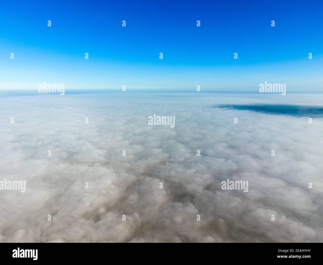 In the skies above the fog. Sunrise over the fog. Clouds near the ...