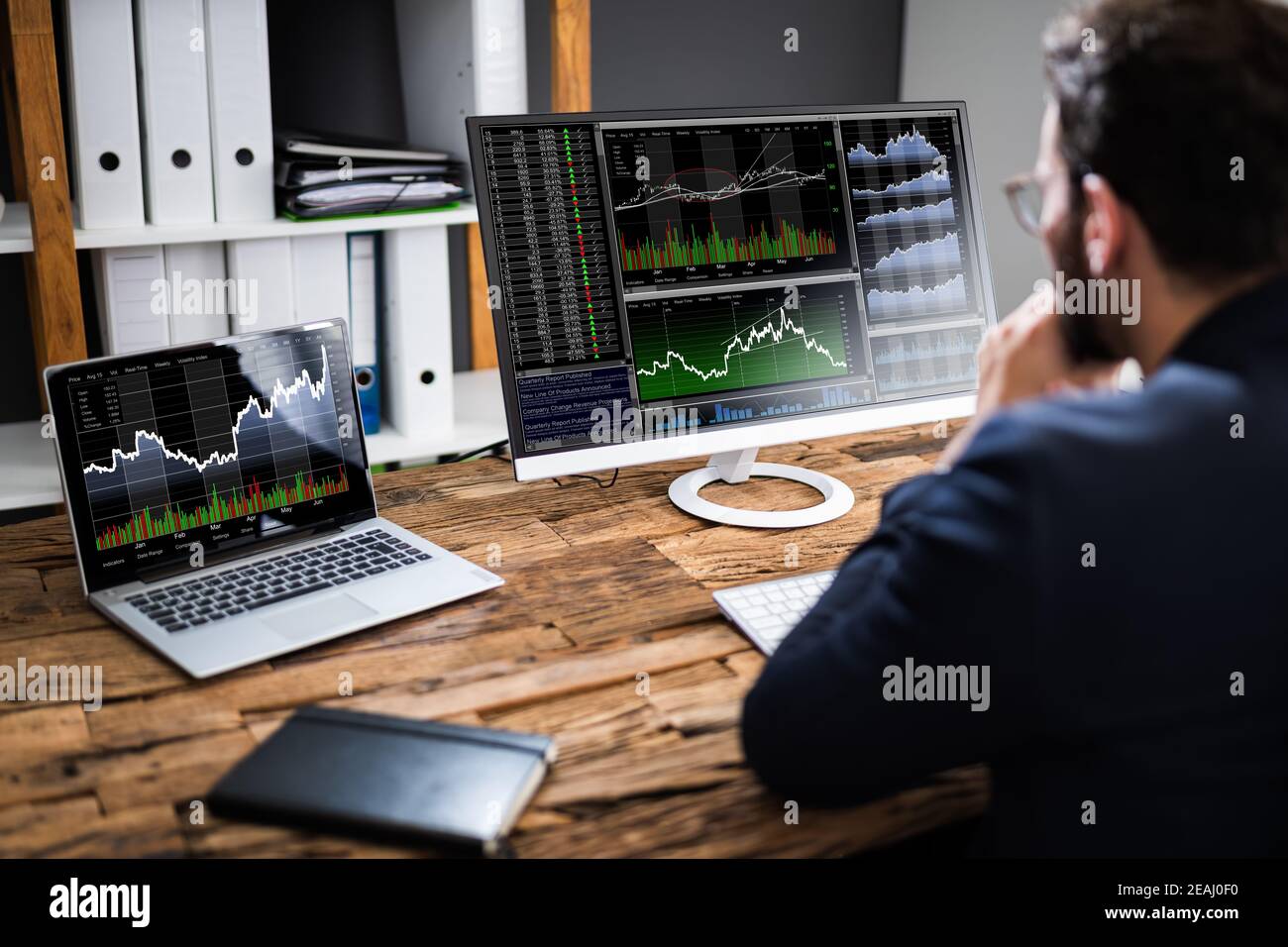 Stock Exchange Business Analyst Using Computer Stock Photo - Alamy