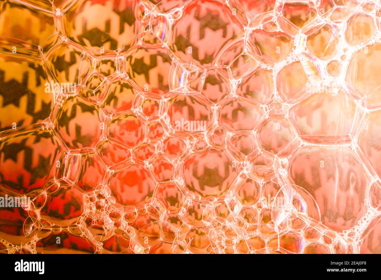 Oil bubbles inside water base form patterns Stock Photo - Alamy