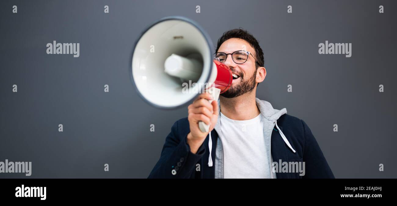 Man Hand Holding Megaphone Stock Photo - Alamy