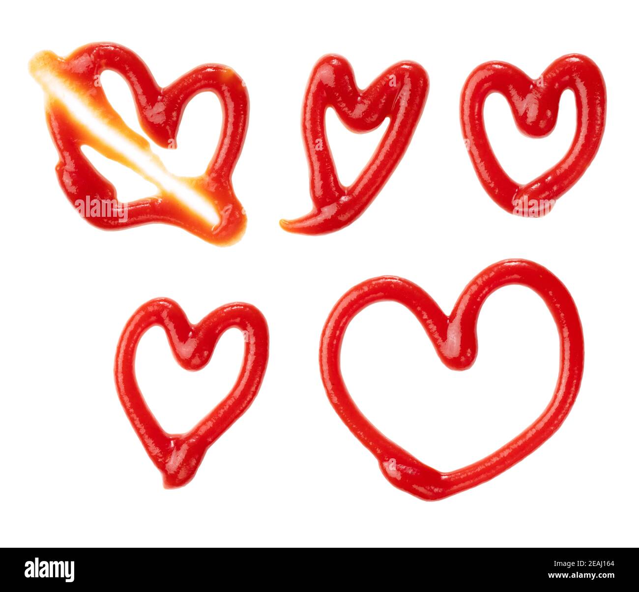 Various heart-shaped ketchup laid on a white background Stock Photo - Alamy