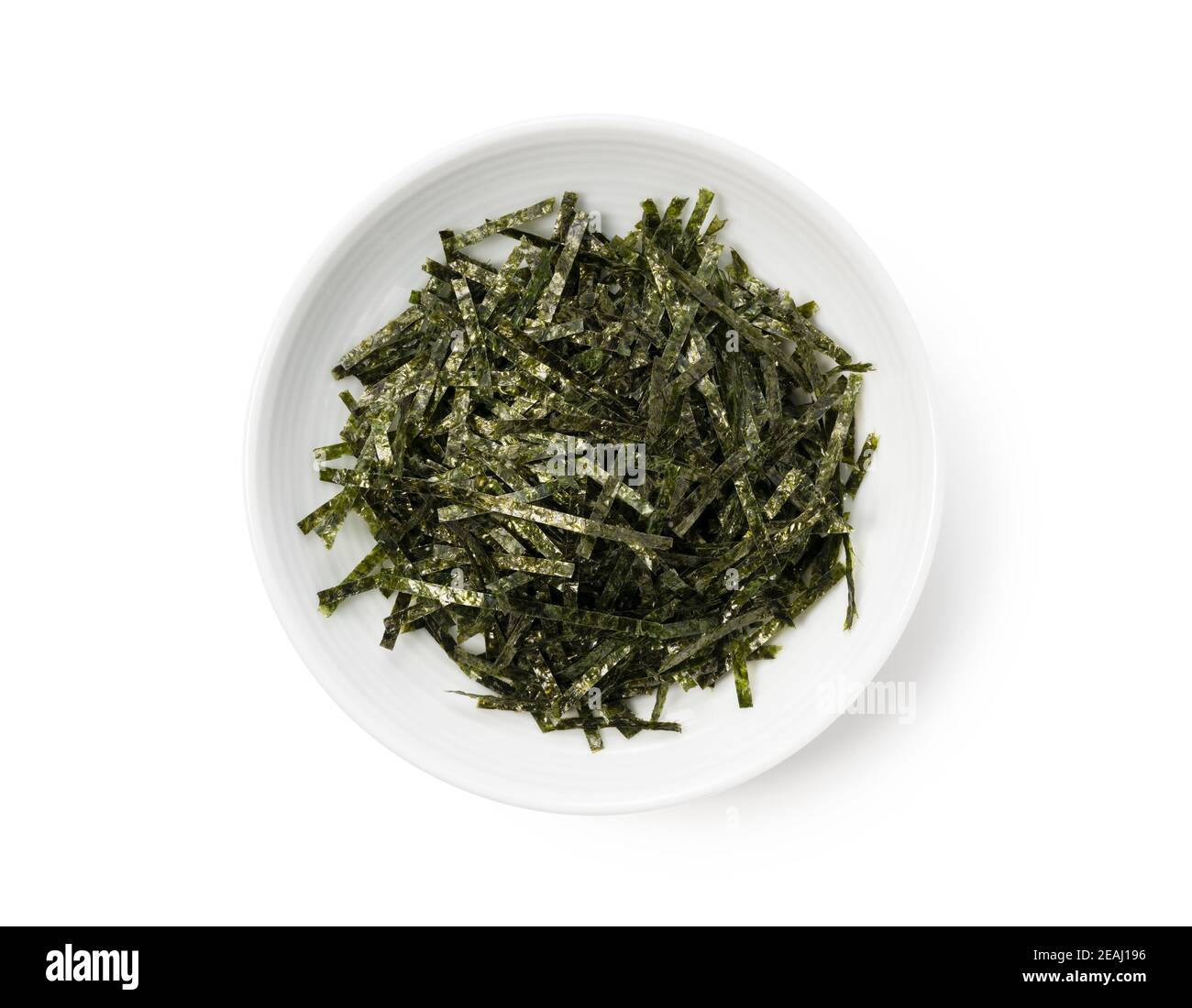Chopped seaweed on a white background Stock Photo - Alamy