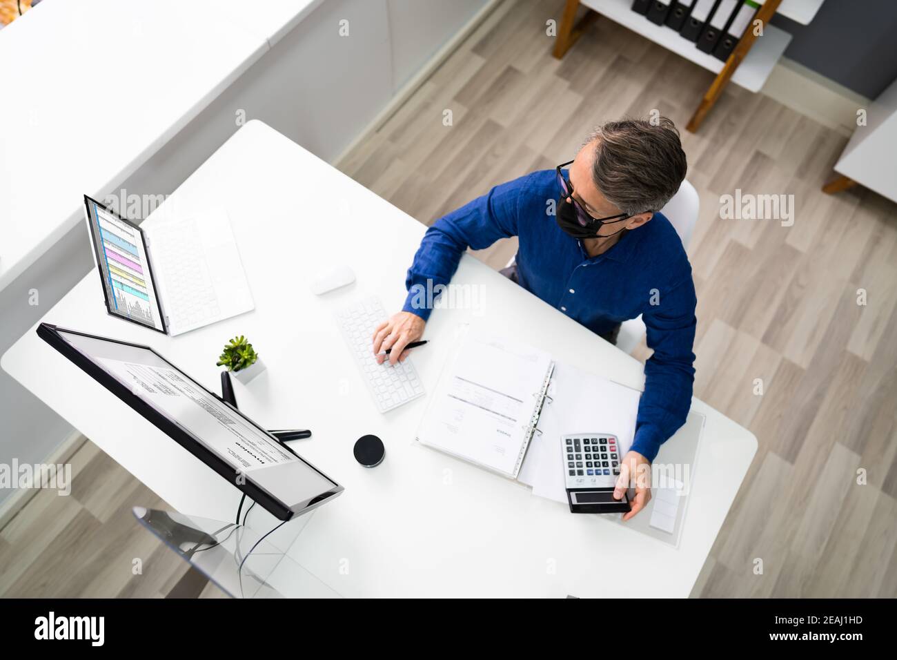 Senior Accountant Man Working With Invoice Stock Photo - Alamy