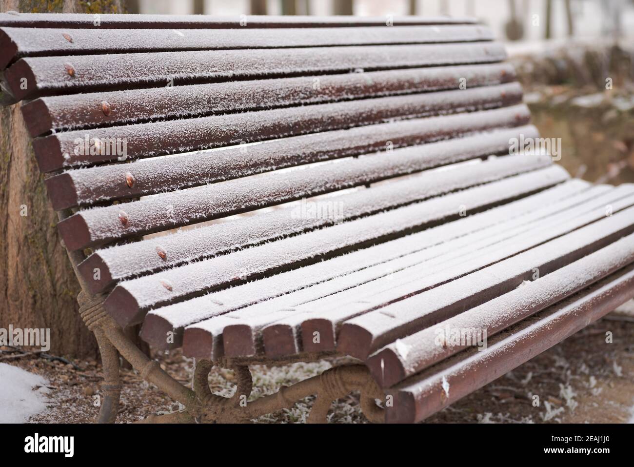 isolated frozen bench with rime and snow after a winter storm Stock ...