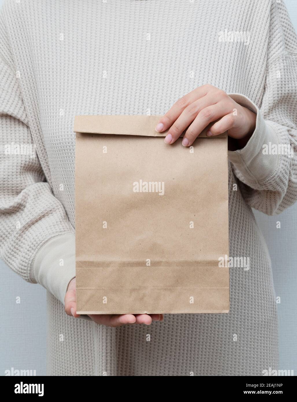 Female african hand holding paper hi-res stock photography and images ...