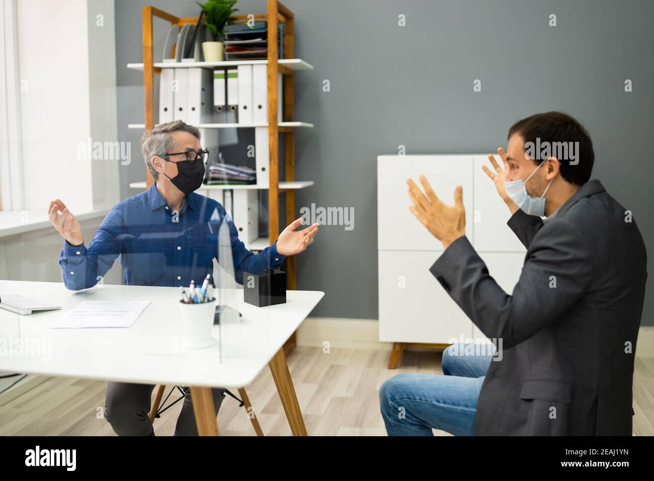 Angry Business Man Fighting At Work Stock Photo - Alamy