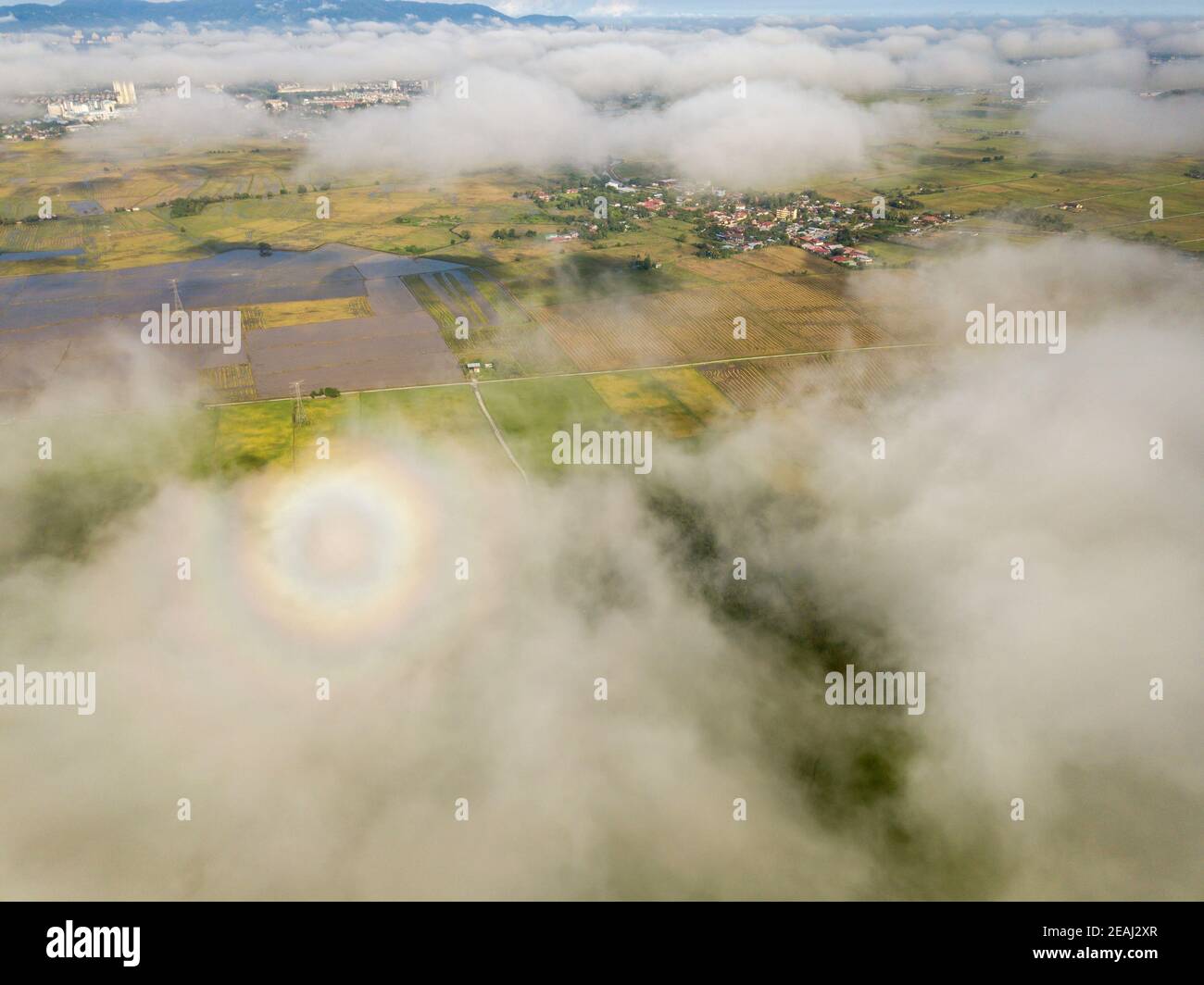 Rainbow halo over cloud Stock Photo - Alamy