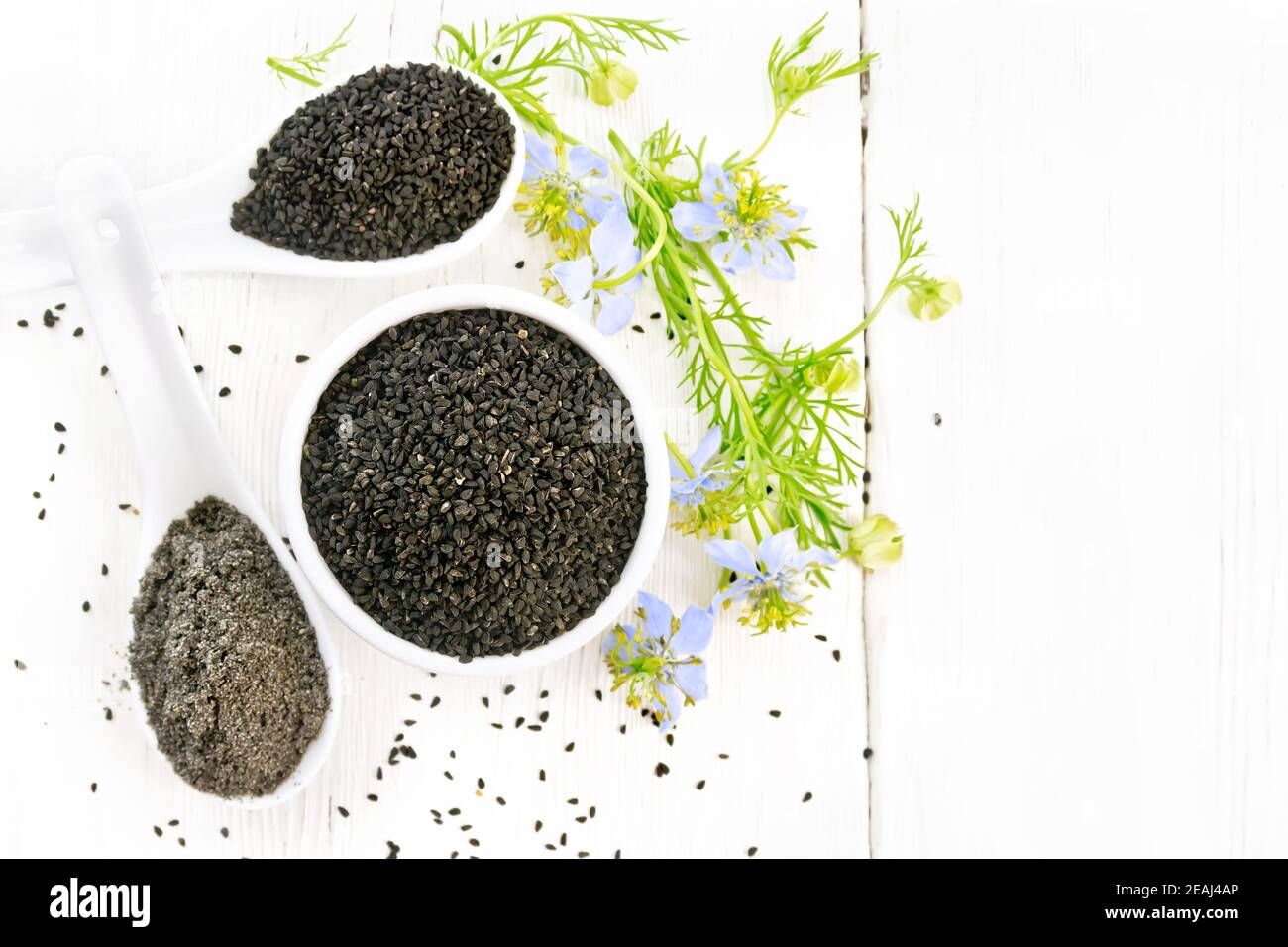 Spoon flour on black Cut Out Stock Images & Pictures - Alamy