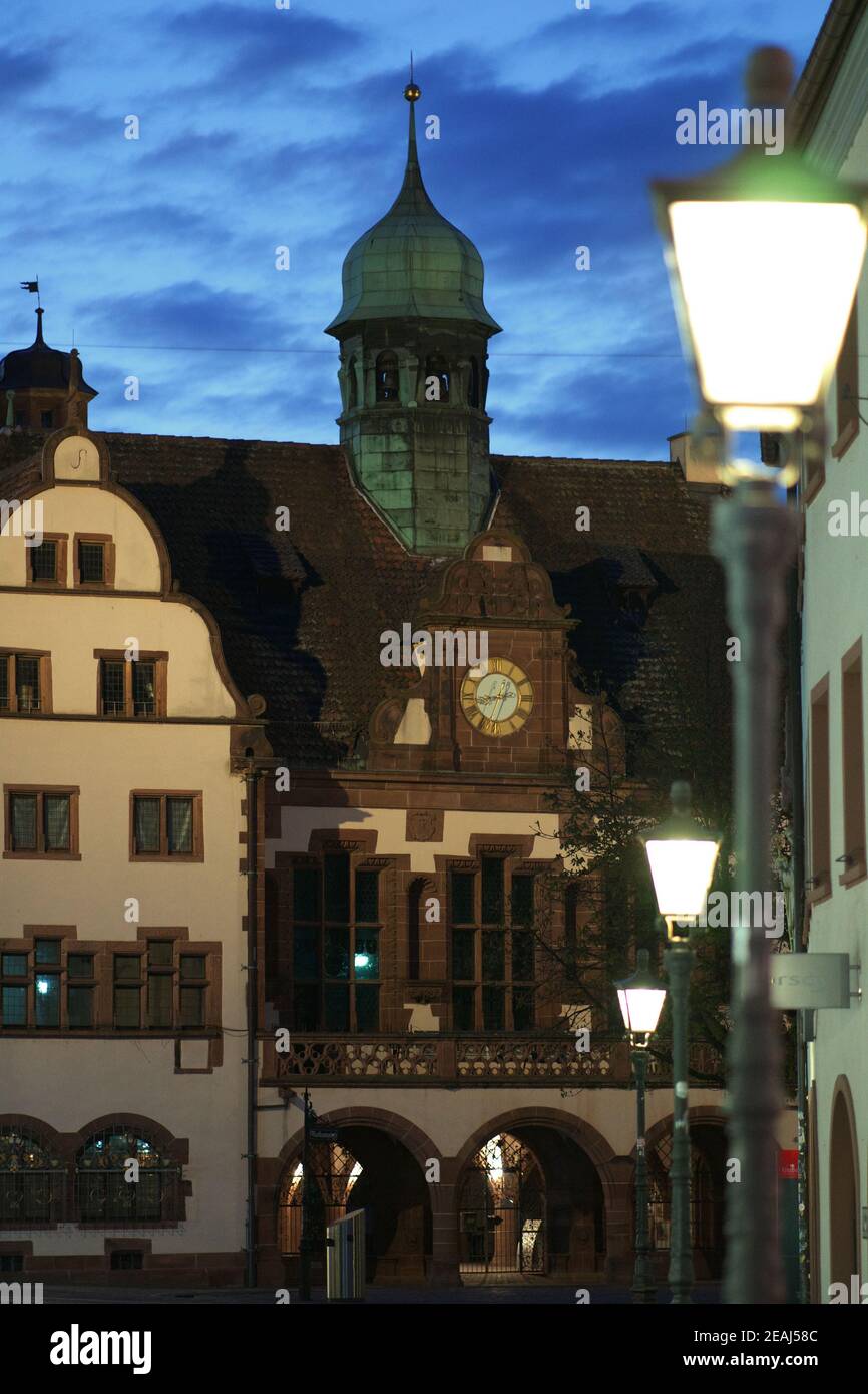 Vertical shot of the old town hall in Freiburg, Germany under a gloomy ...