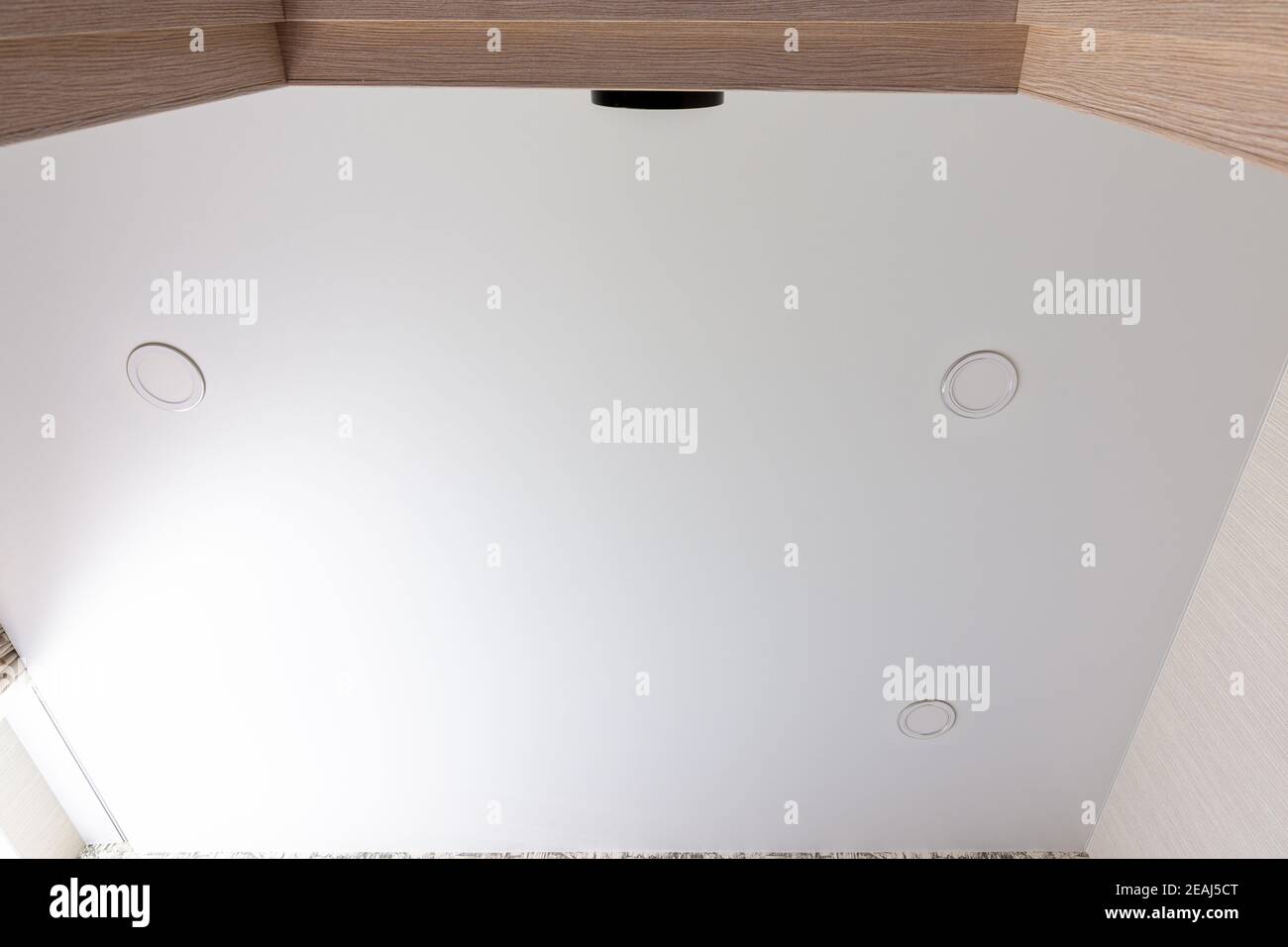 Classic white glossy ceiling with recessed spotlights Stock Photo - Alamy