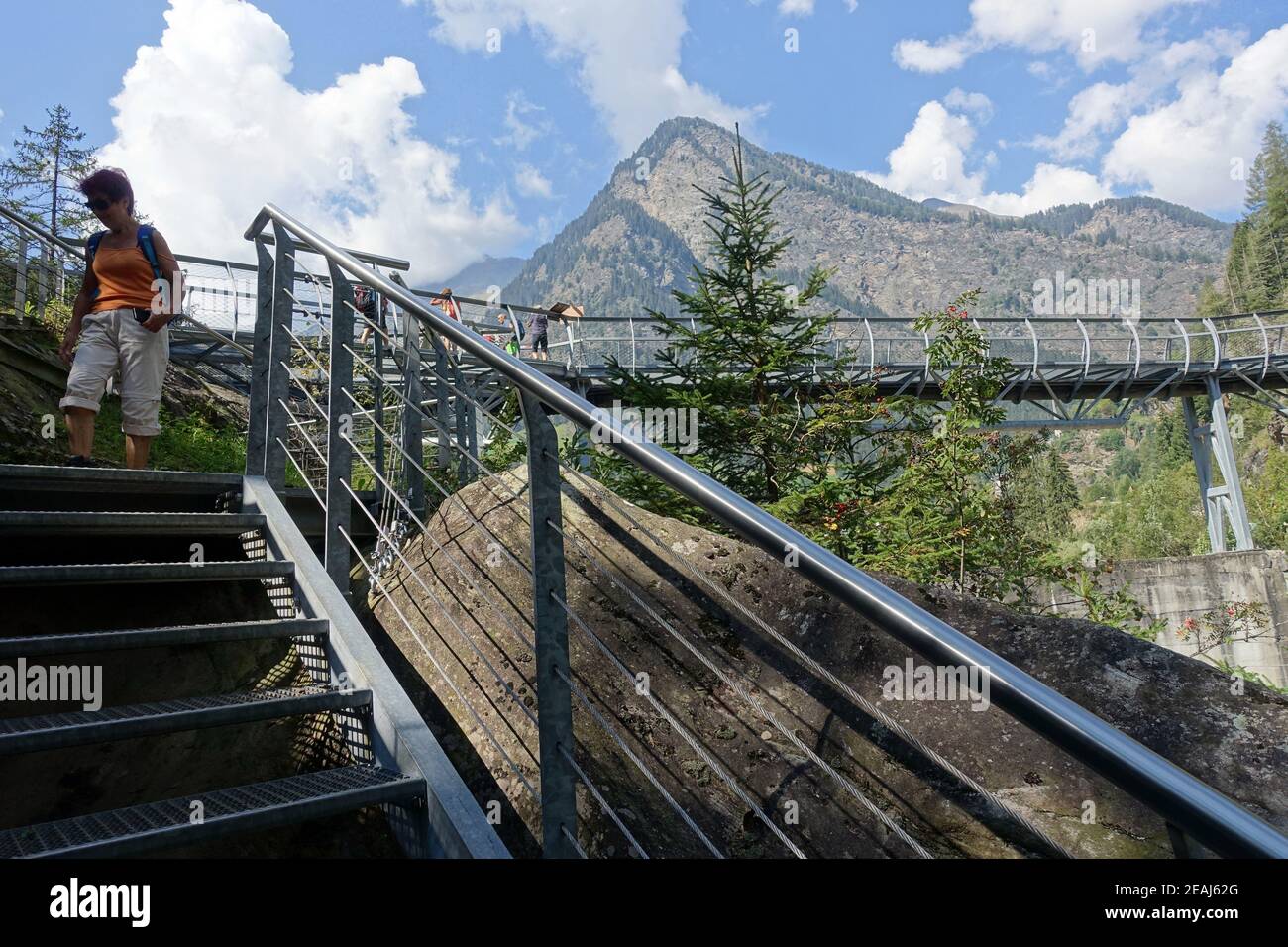 Hiking on the gorge trail Passeier Valley between Moos and St. Leonhard ...