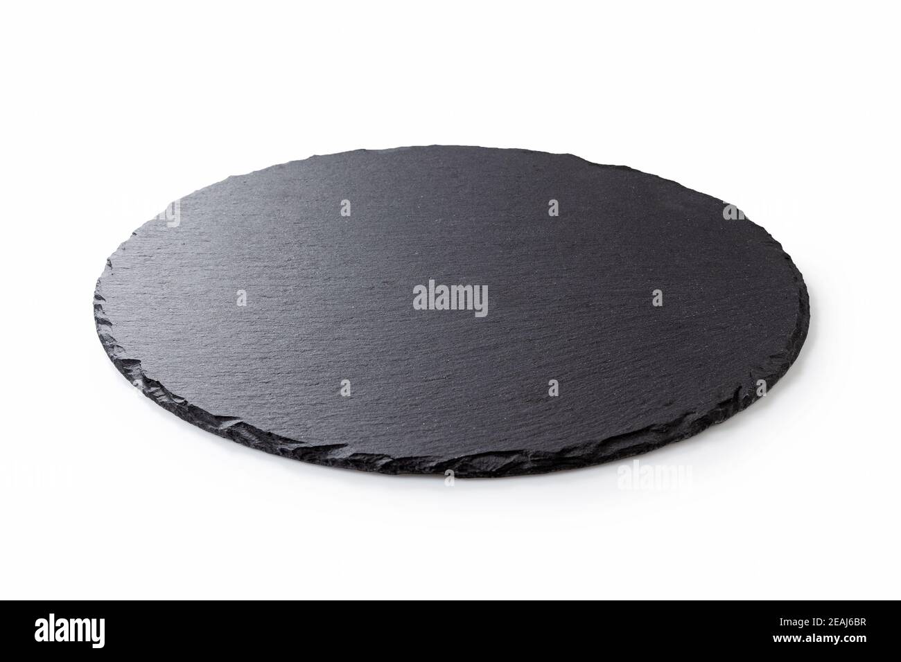 Black round stone plate with white background Stock Photo - Alamy