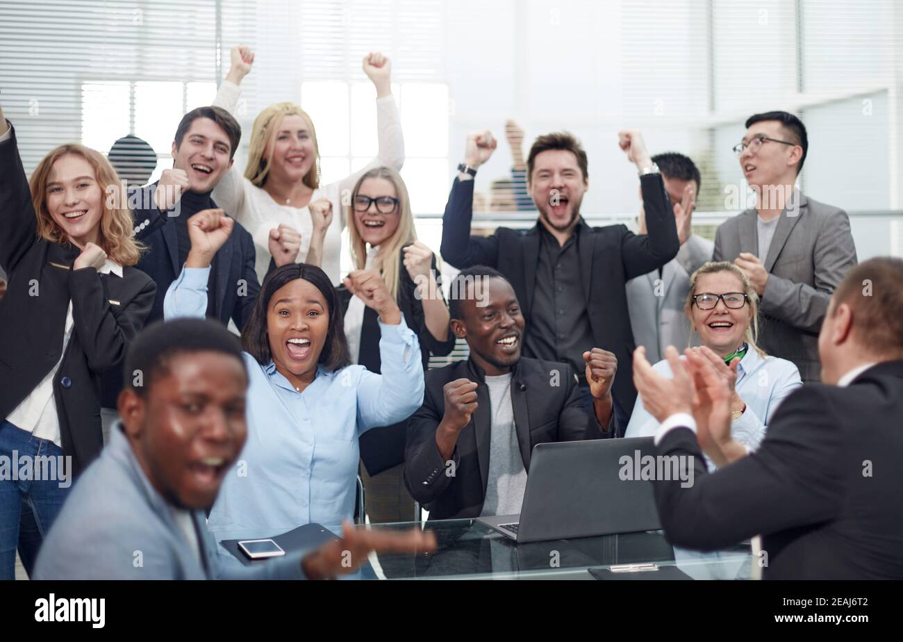 big happy business team showing their success Stock Photo - Alamy