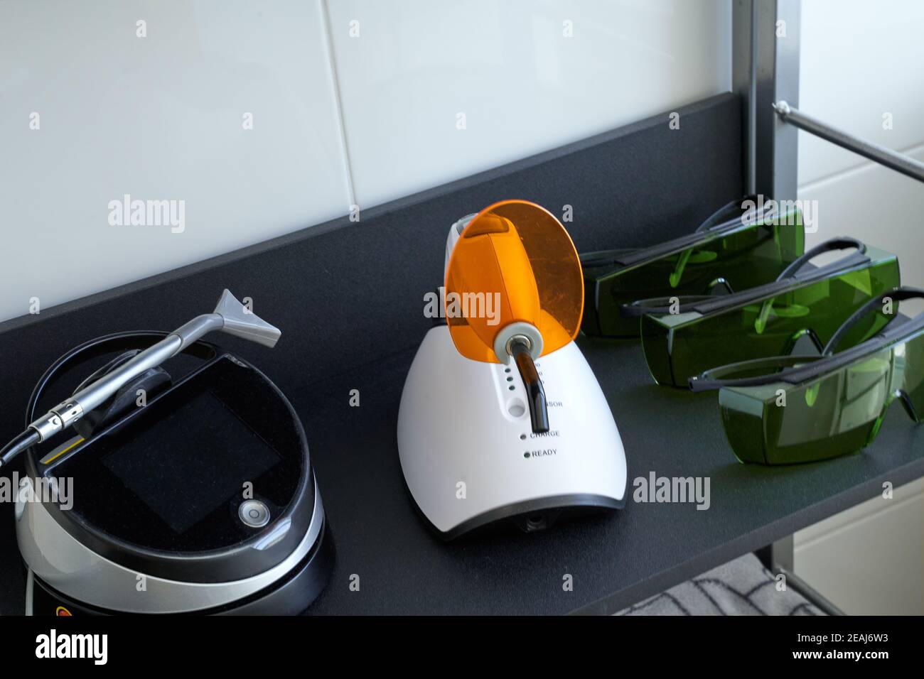 Modern equipment for laser-curing of teeth at dentist office Stock ...