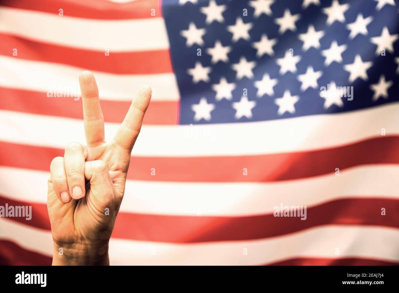 American flag with victory sign Stock Photo - Alamy