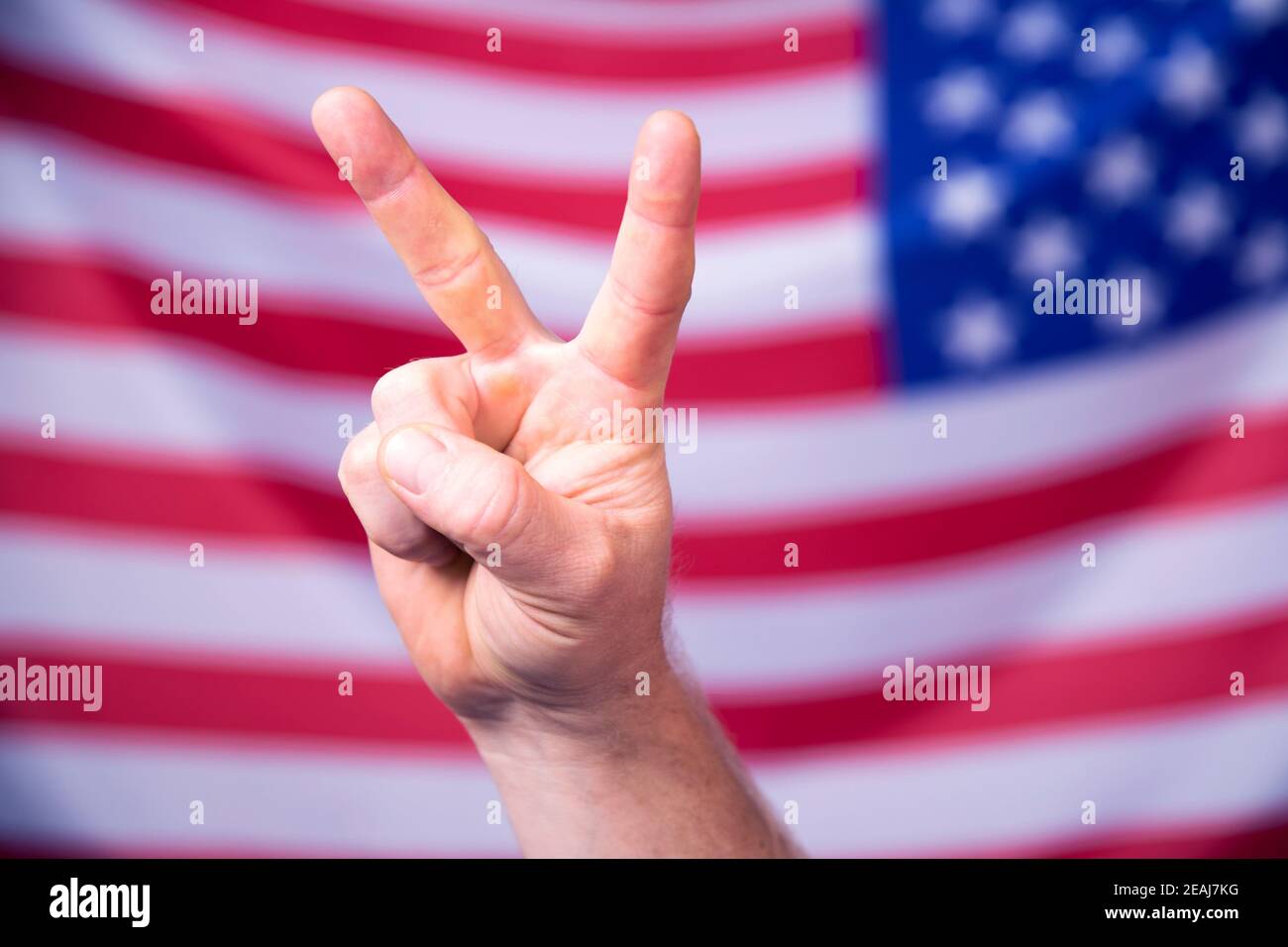 American flag with victory sign Stock Photo - Alamy