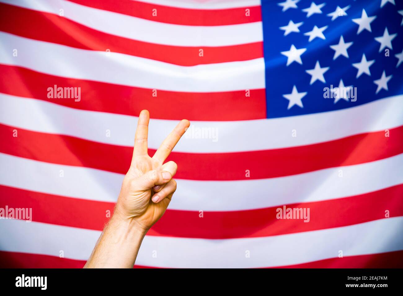 American flag with victory sign Stock Photo - Alamy