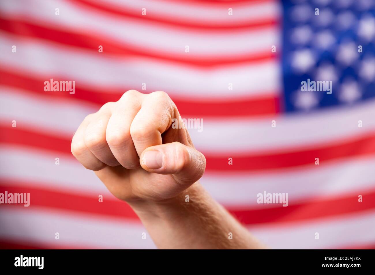 American flag with fist Stock Photo - Alamy