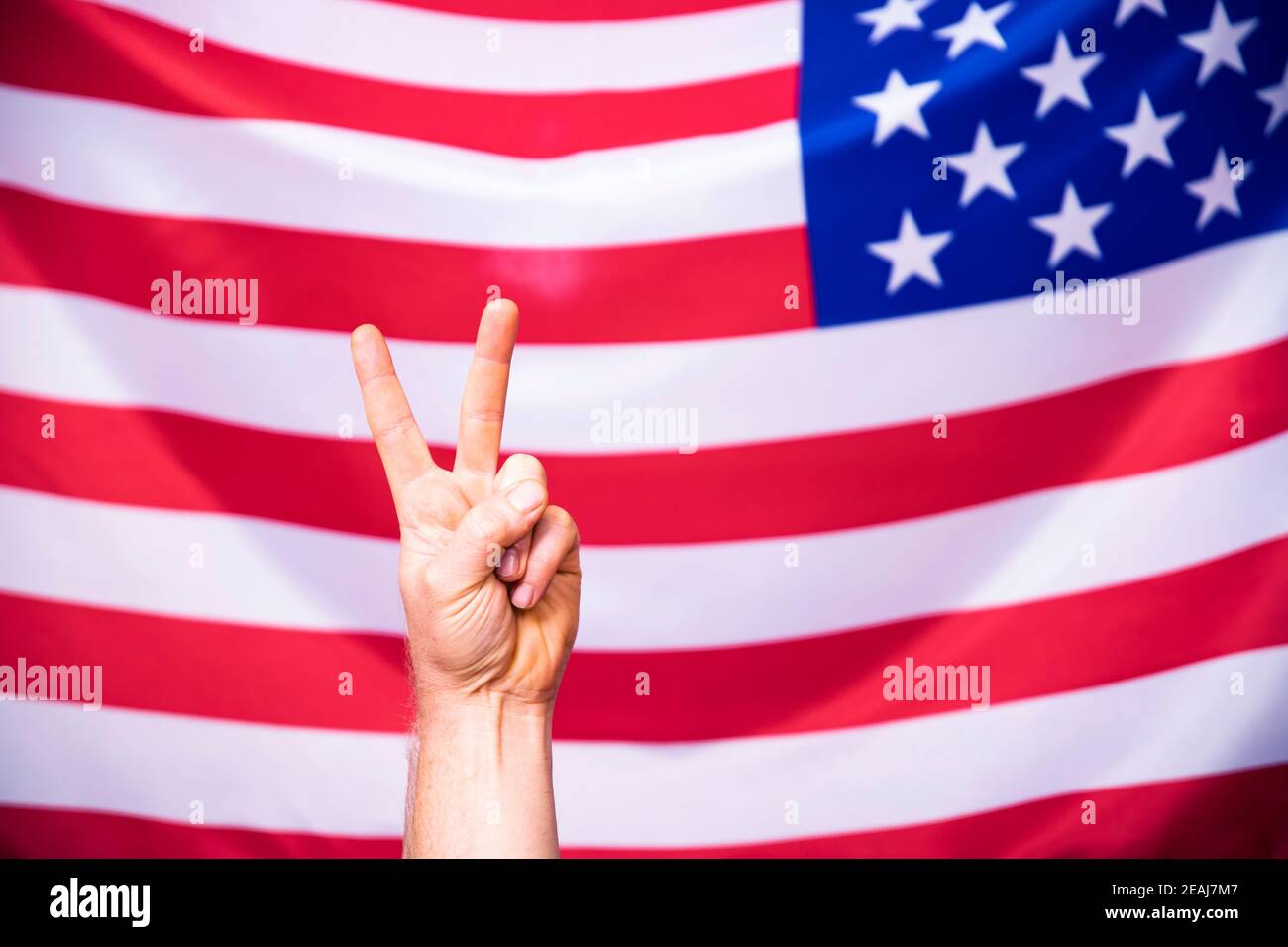 American flag with victory sign Stock Photo - Alamy