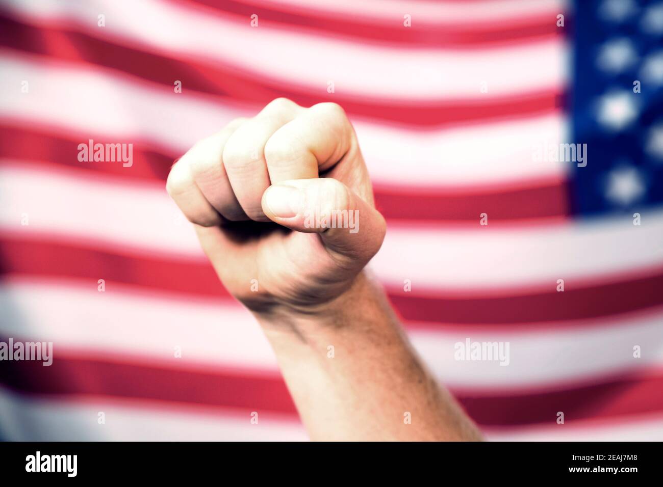 American flag with fist Stock Photo - Alamy