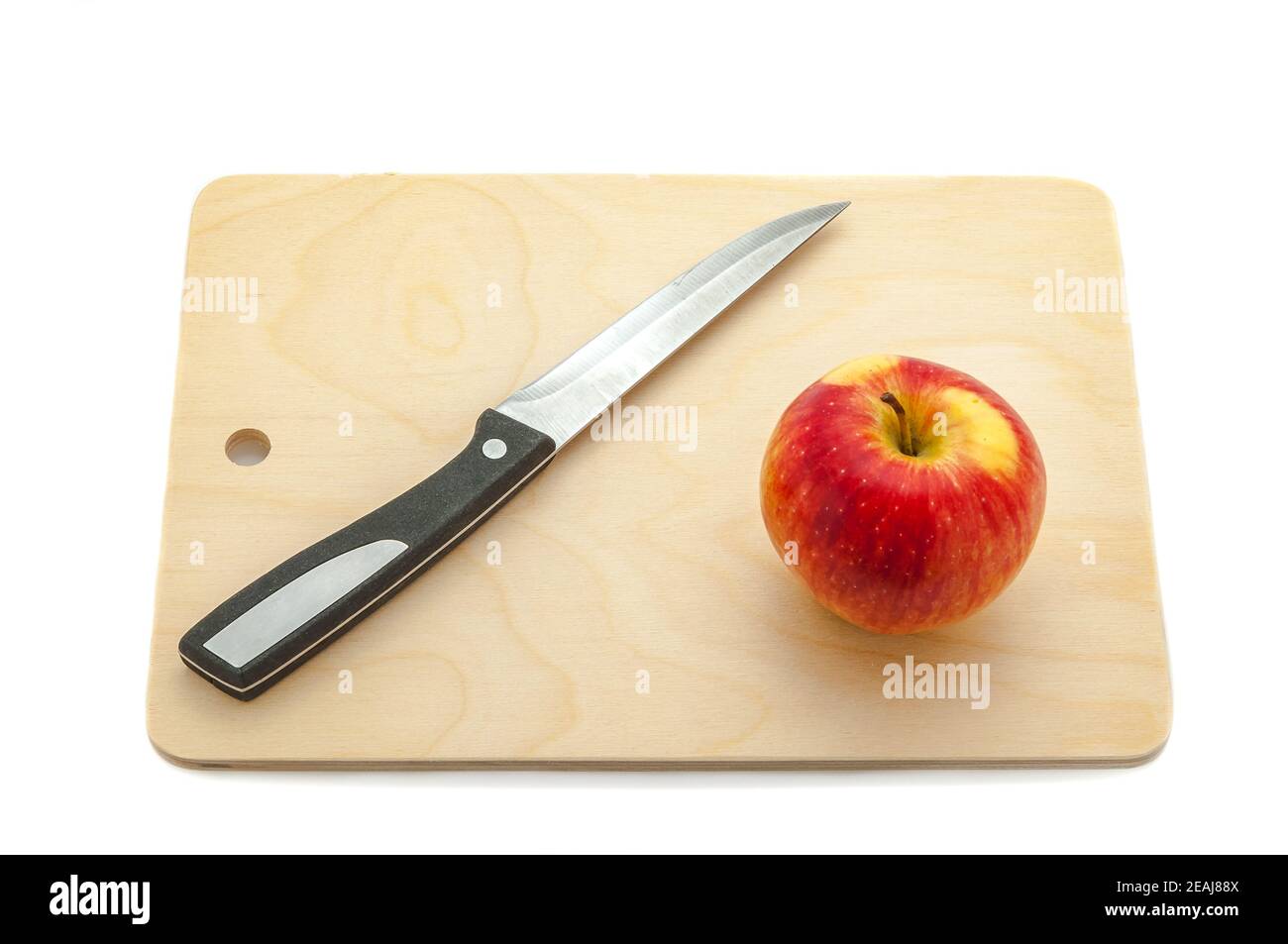 Woman knife lemon on Cut Out Stock Images & Pictures - Alamy