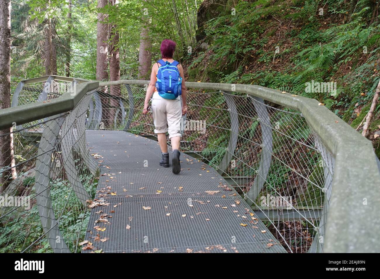 Hiking on the gorge trail Passeier Valley between Moos and St. Leonhard ...