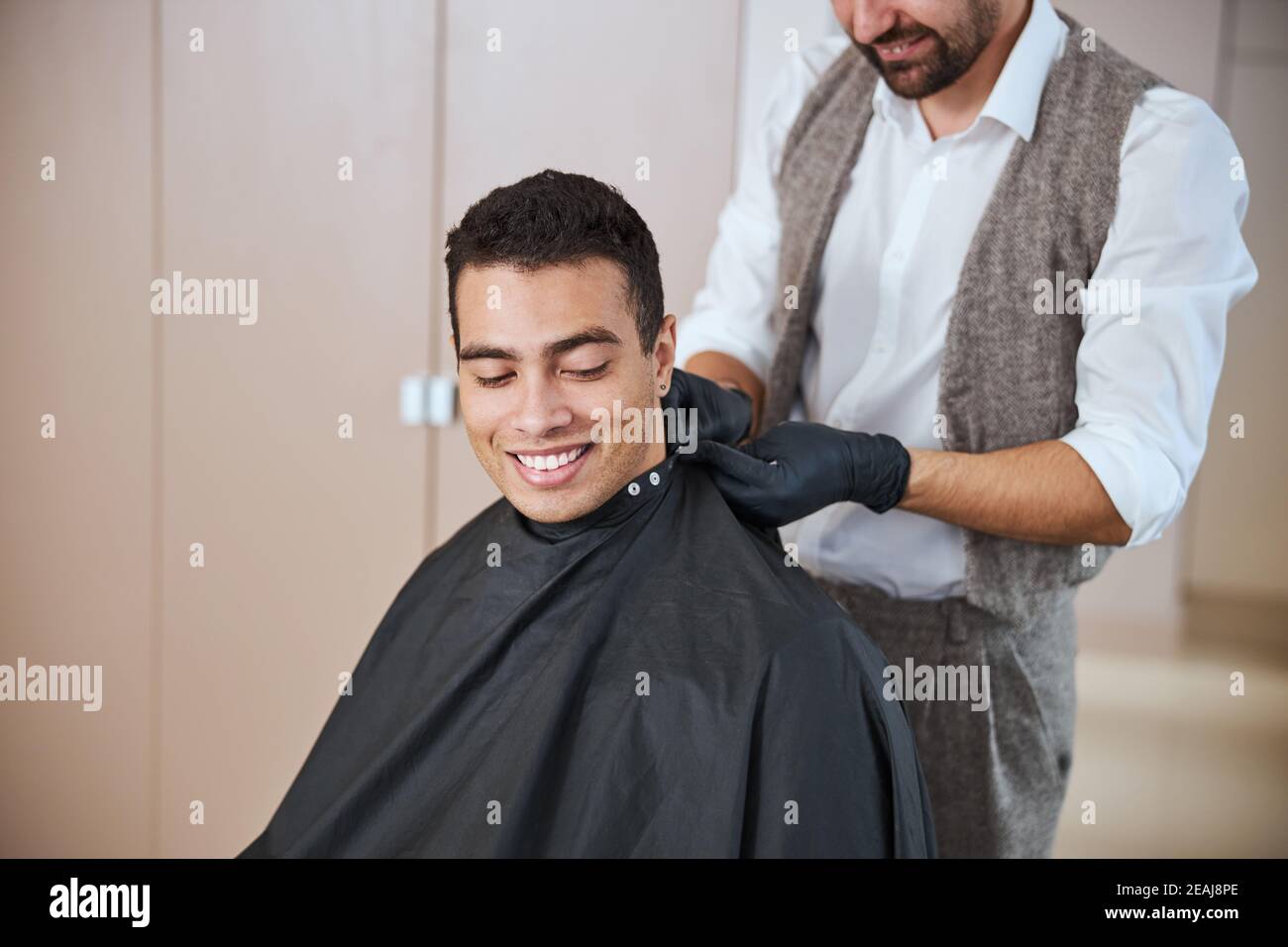 Indian man styling hair hi-res stock photography and images - Alamy