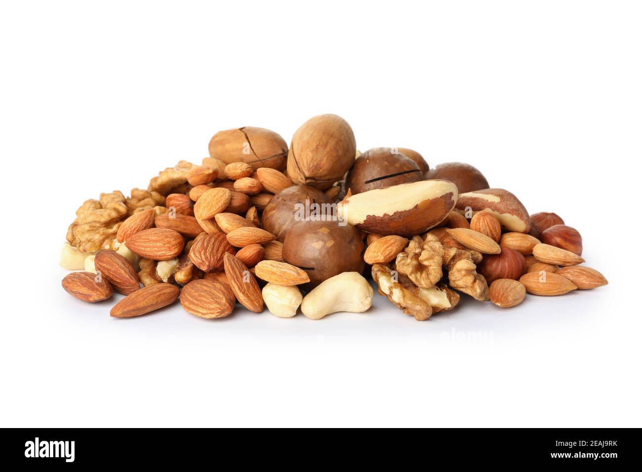 Heap of different tasty nuts isolated on white background Stock Photo ...