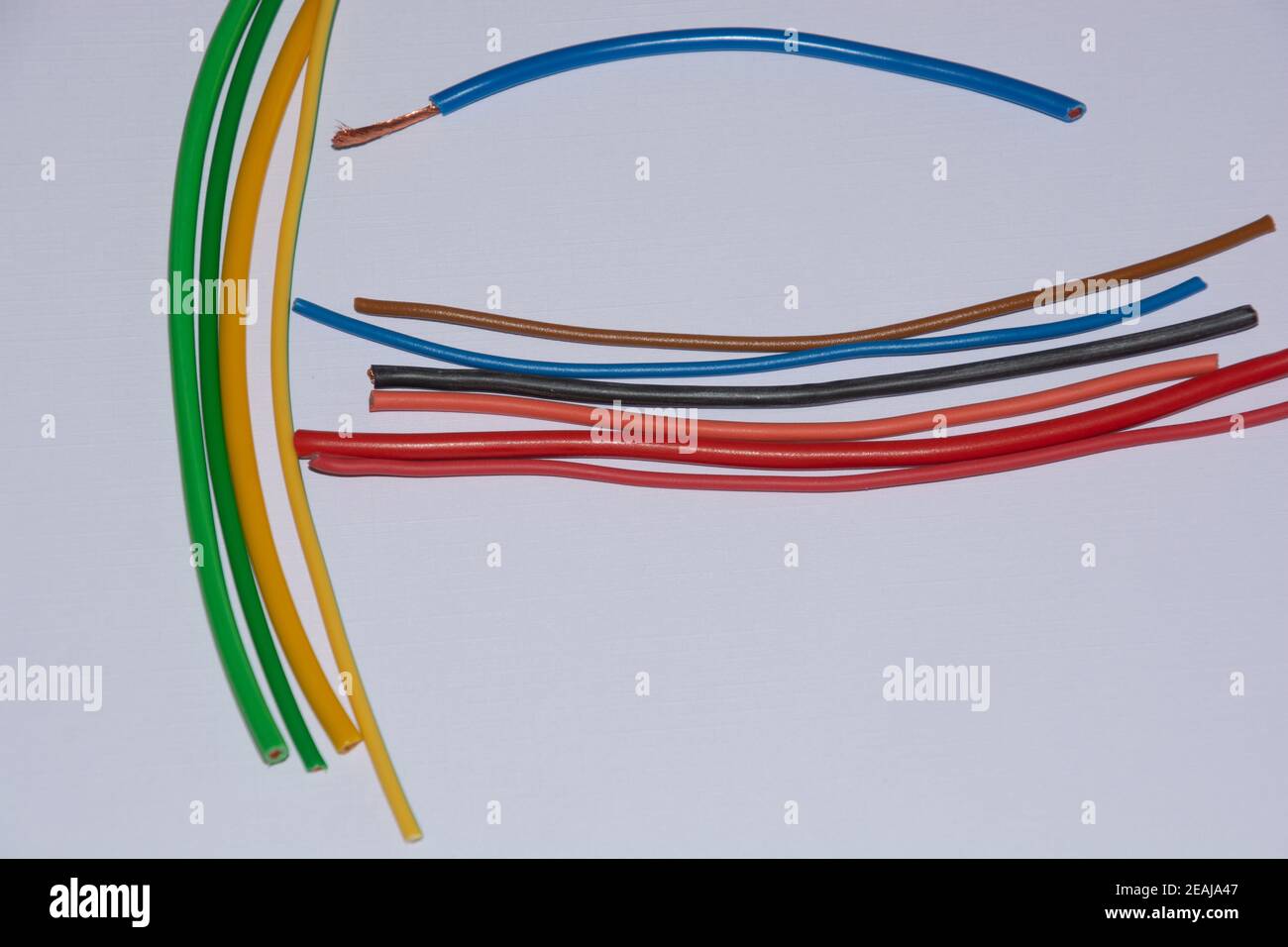 copper electrical cables on white background top view networking theme ...