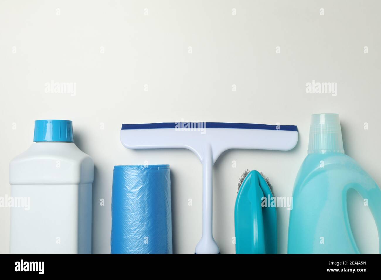 Different cleaning tools on white background, space for text Stock ...